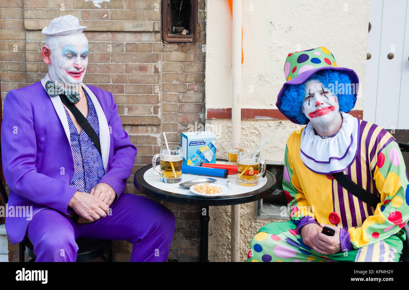 Two Clowns Having a Beer Stock Photo - Alamy