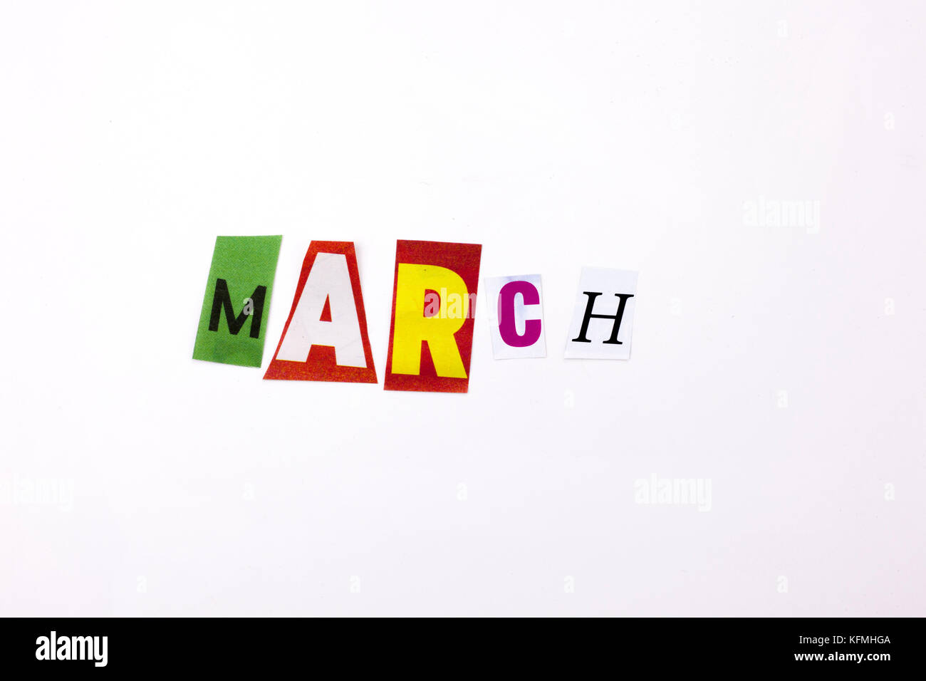 A word writing text showing concept of MARCH made of different magazine ...