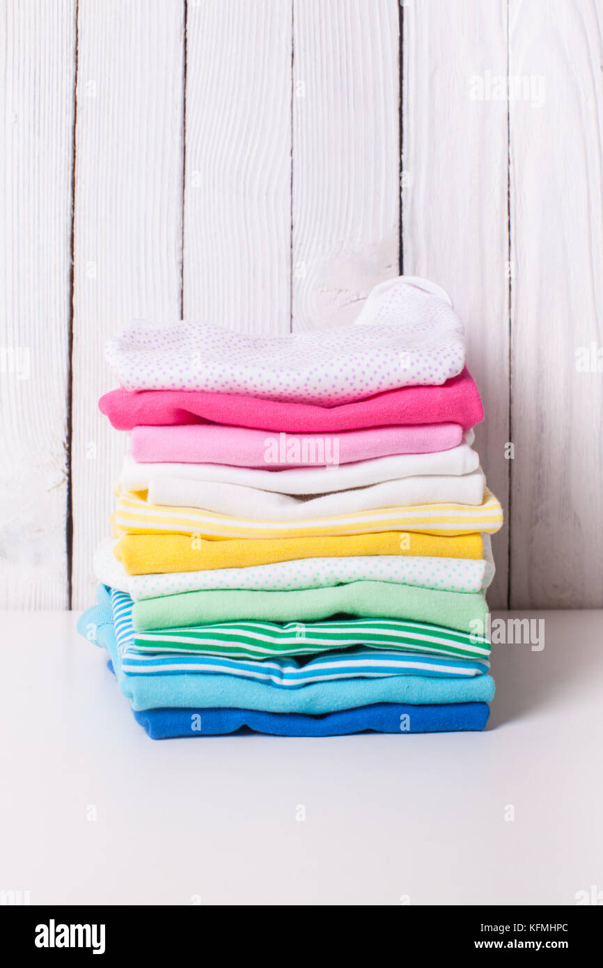 Folded baby clothes Stock Photo - Alamy