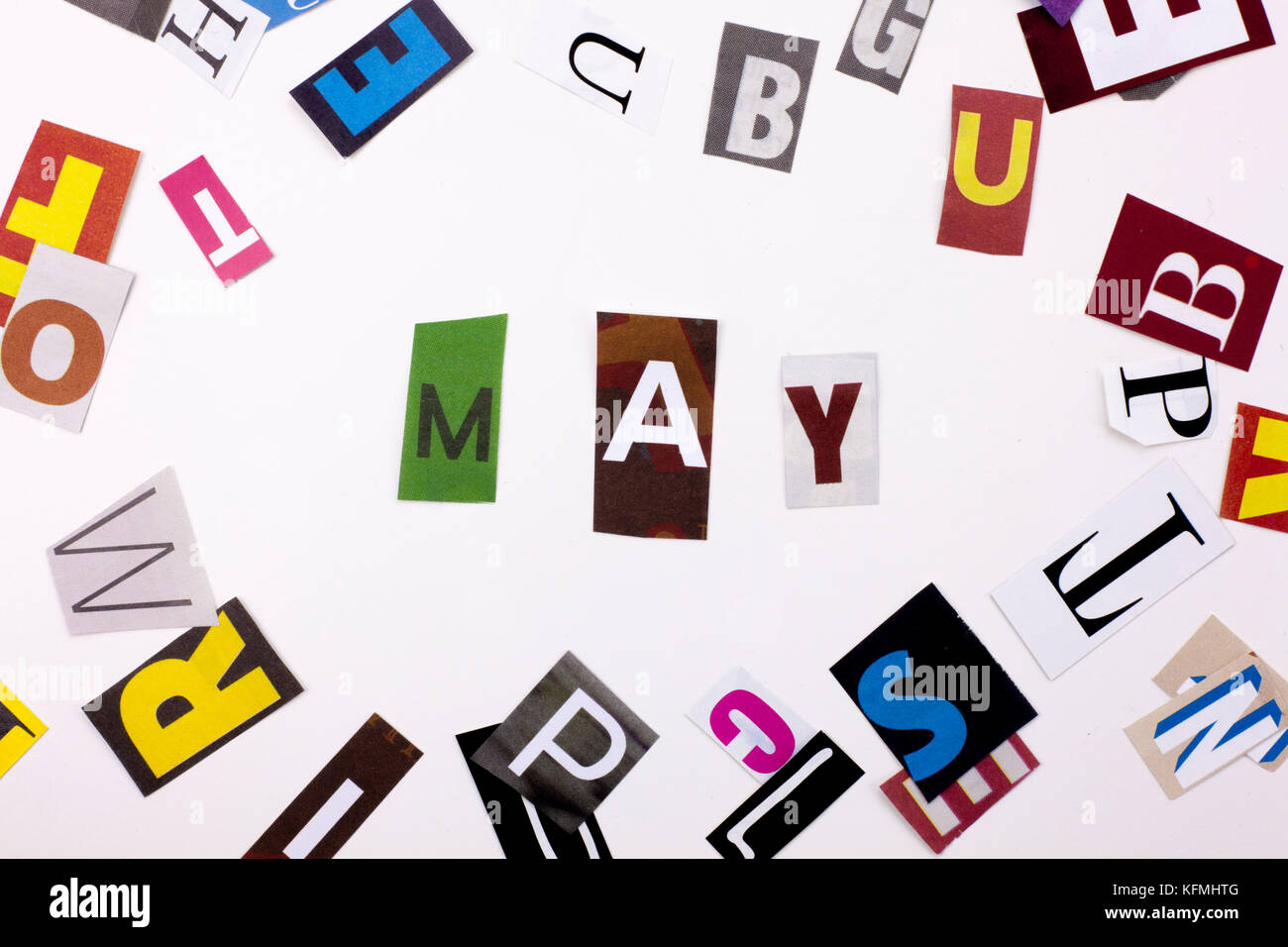 A word writing text showing concept of MAY made of different magazine ...