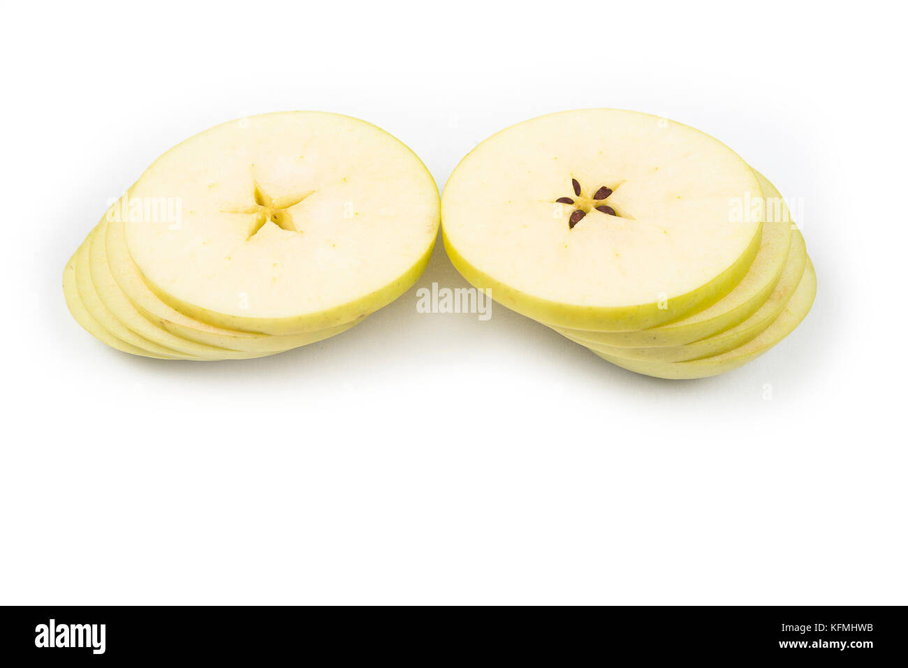 Apple cut on thin slices on each other on the white background Stock ...