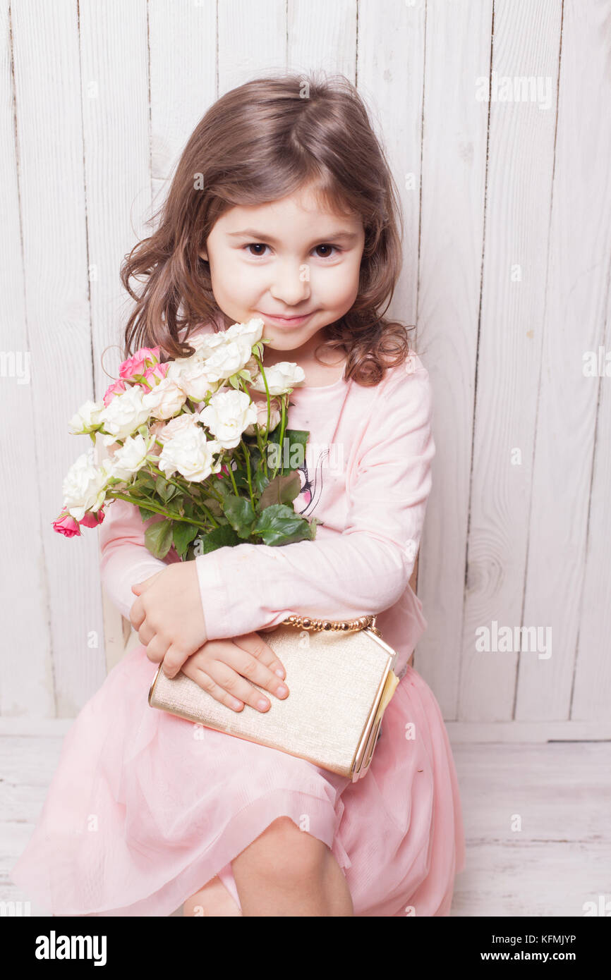 Girl with roses Stock Photo - Alamy