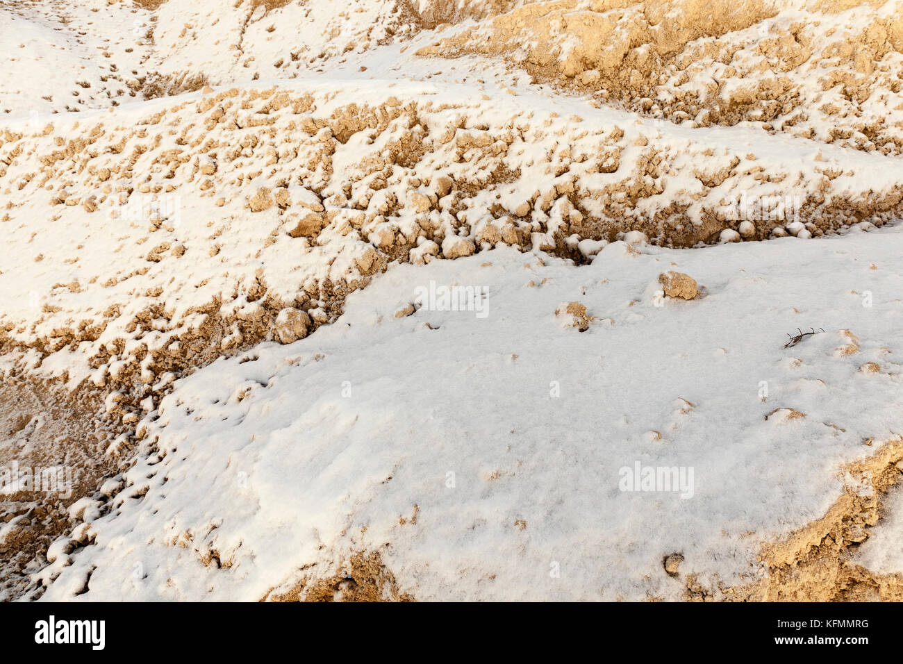 Sand under the snow Stock Photo - Alamy