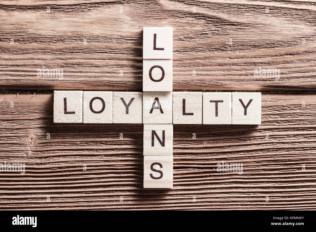 Conceptual business keywords on table with elements of game making ...