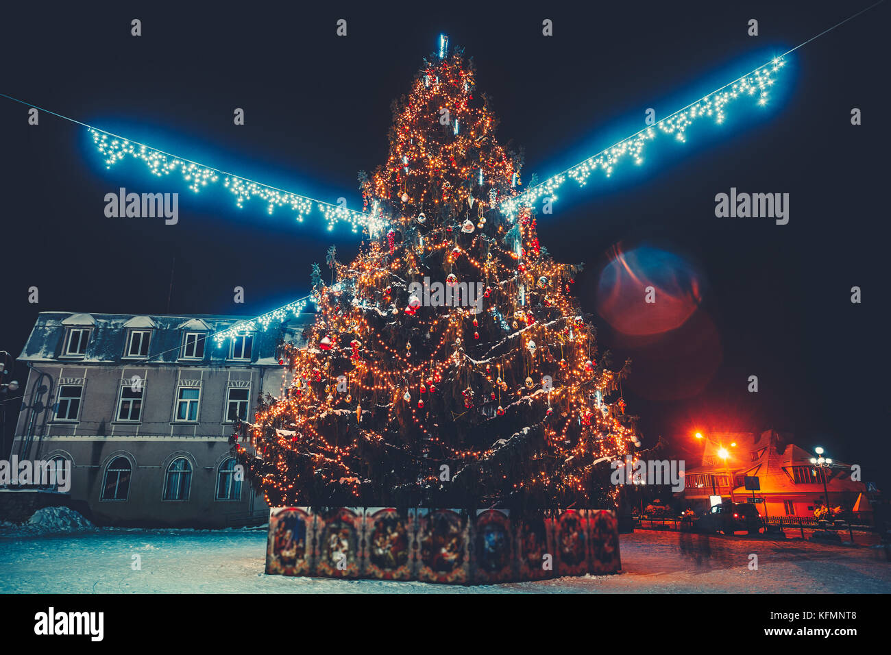 Holiday Christmas Tree Decorated with Color Lights Stock Photo - Alamy