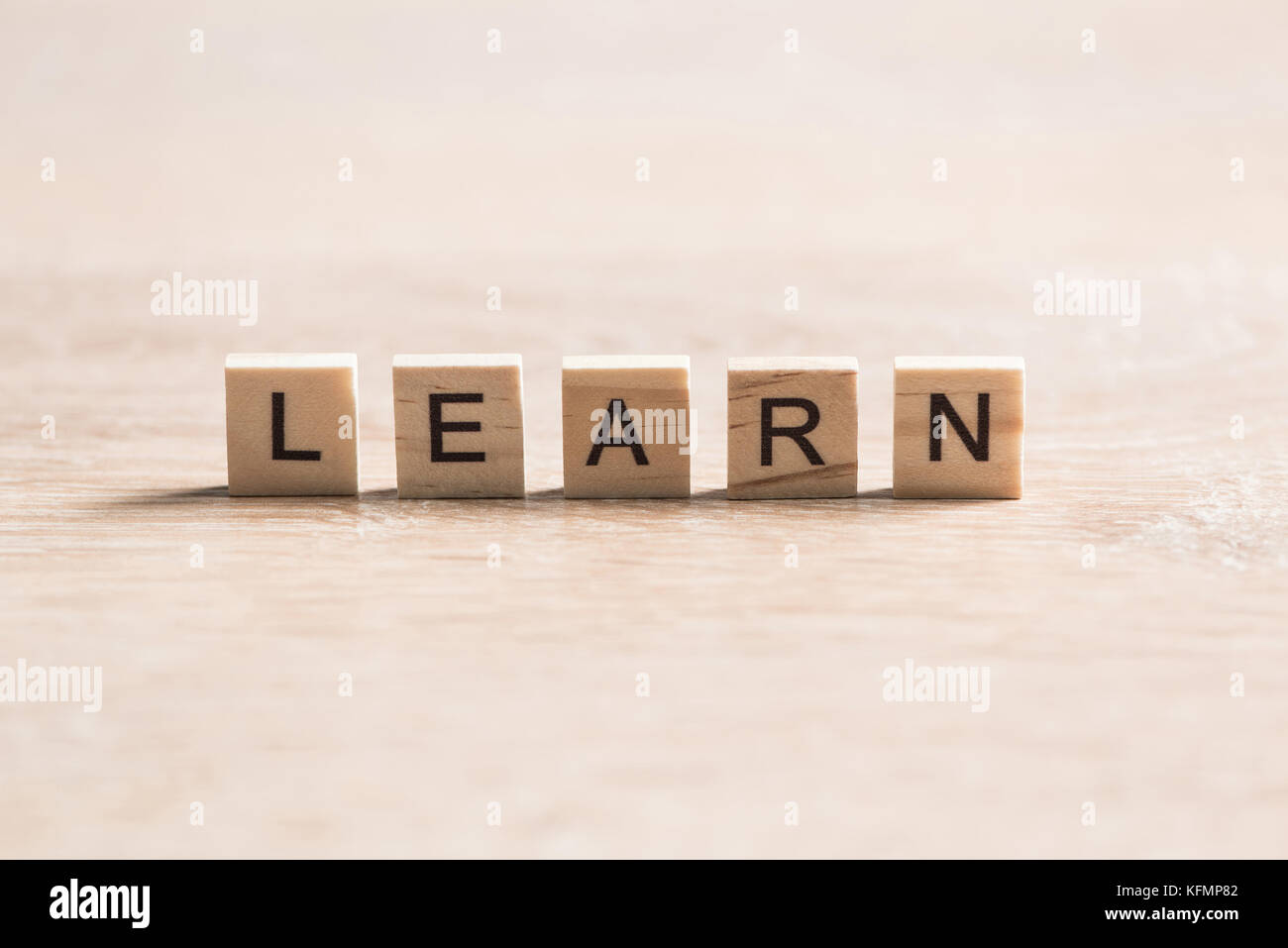 wooden elements with letter collected word learn Stock Photo - Alamy
