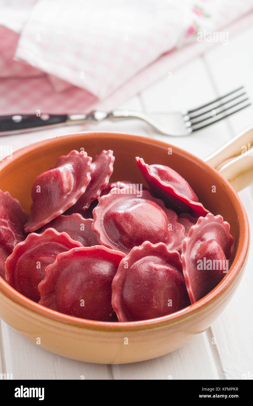 Tasty beetroot ravioli in bowl Stock Photo - Alamy