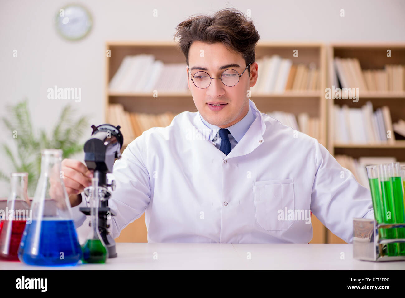 Mad crazy scientist doctor doing experiments in a laboratory Stock ...