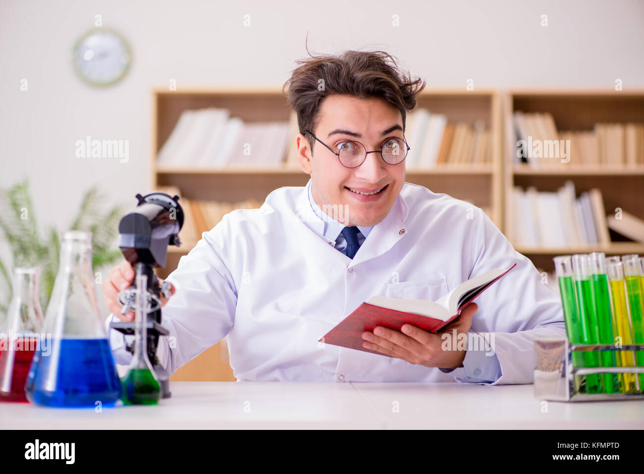 Mad crazy scientist doctor doing experiments in a laboratory Stock ...