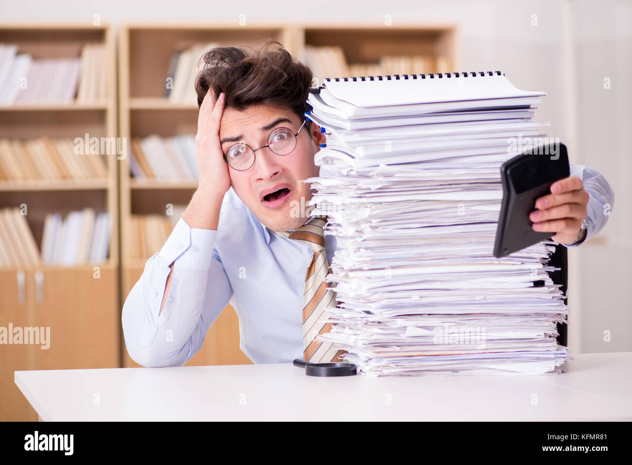 Funny accountant bookkeeper working in the office Stock Photo - Alamy