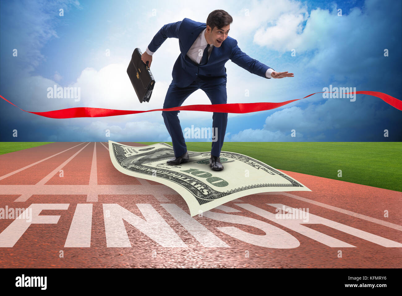 Businessman flying on dollar banknote towards finish line Stock Photo ...