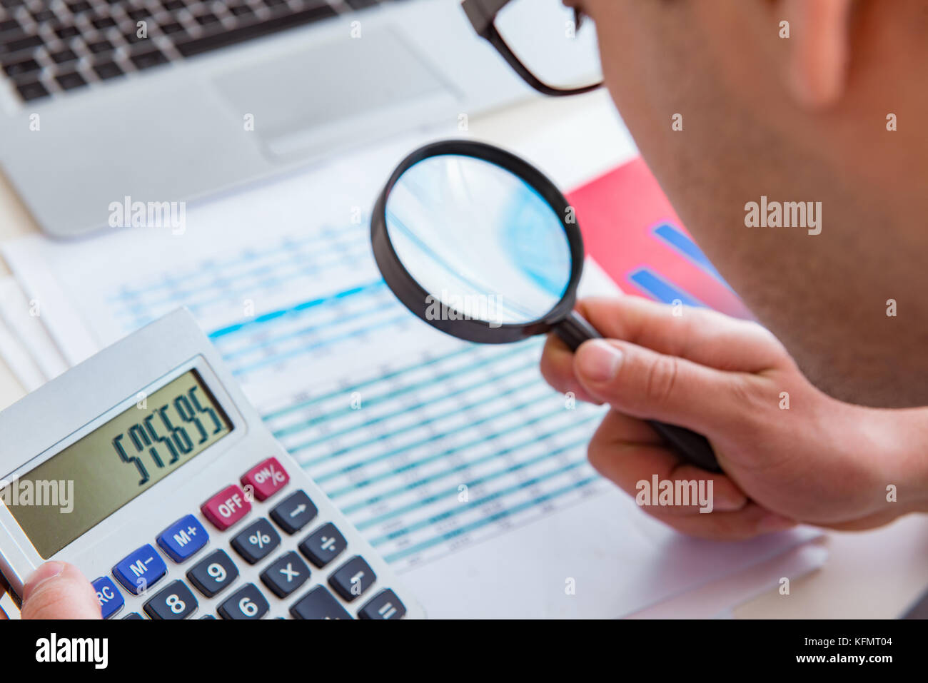 Finance analyst looking and financial reports hi-res stock photography ...