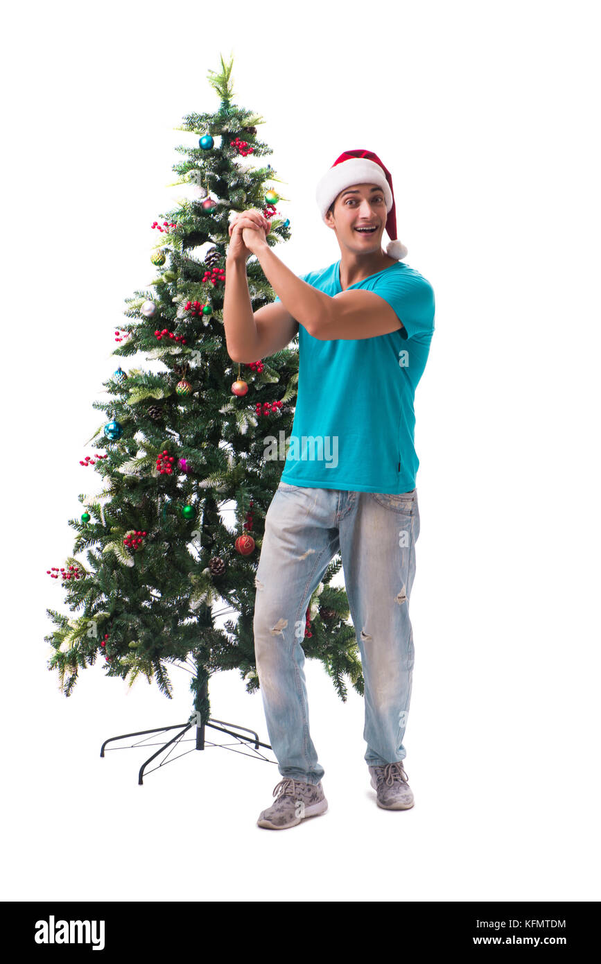 Young man decorating christmas tree isolated on white Stock Photo - Alamy