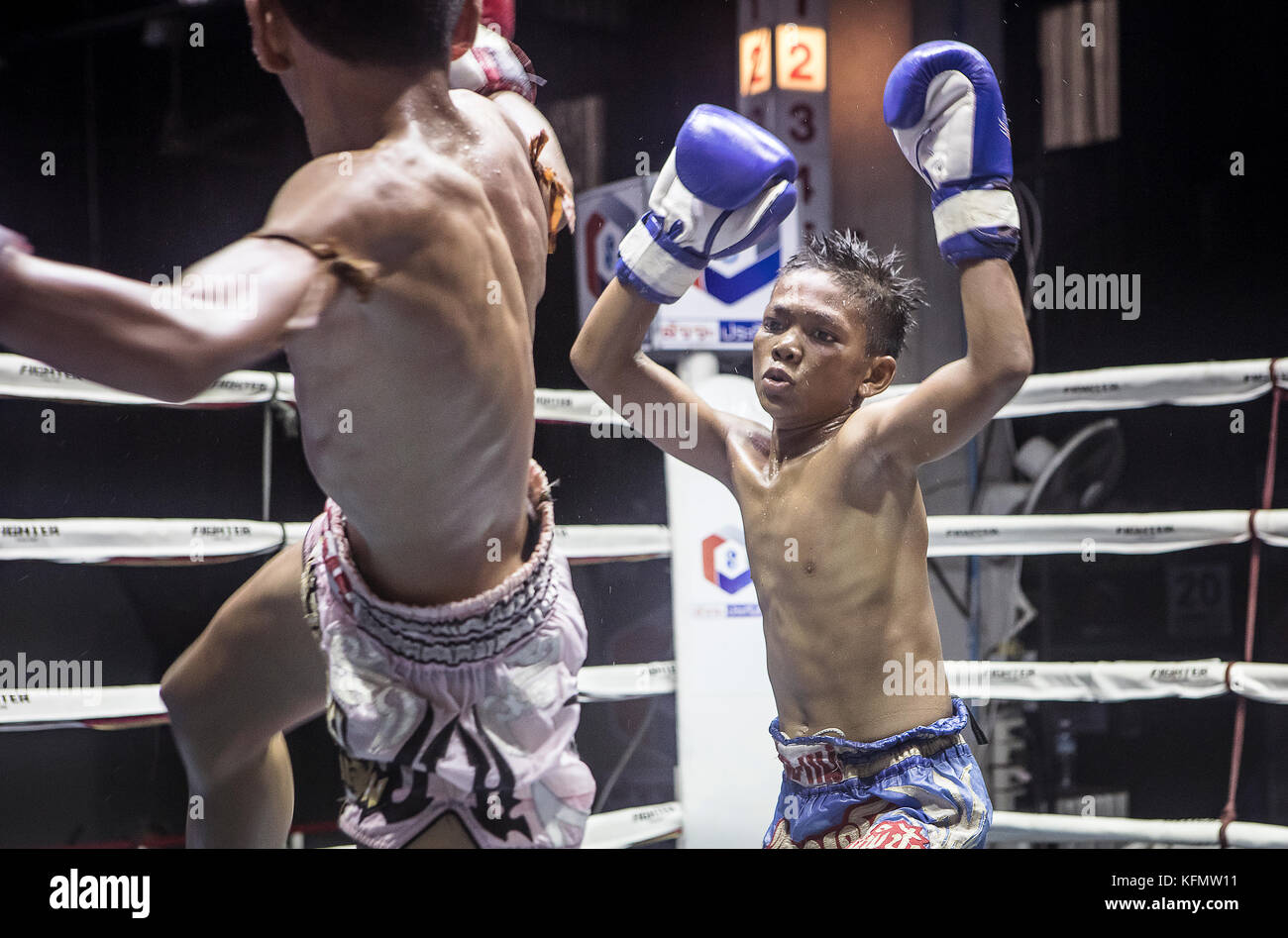 Boys, Muay Thai boxers fighting, Paktonchai, Korat, Thailand Stock ...