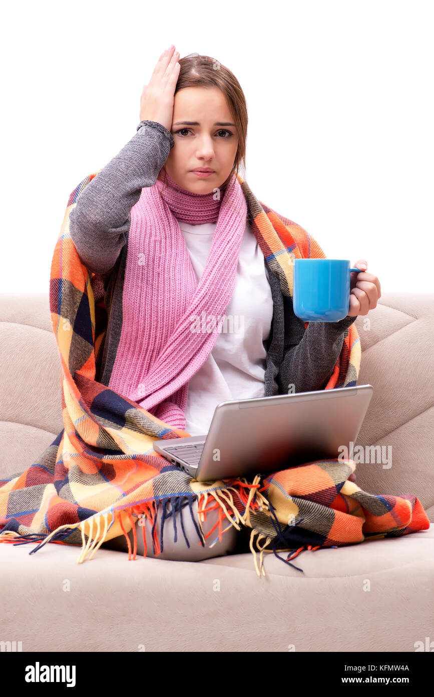 Teenager suffering from cold sitting on coach Stock Photo - Alamy