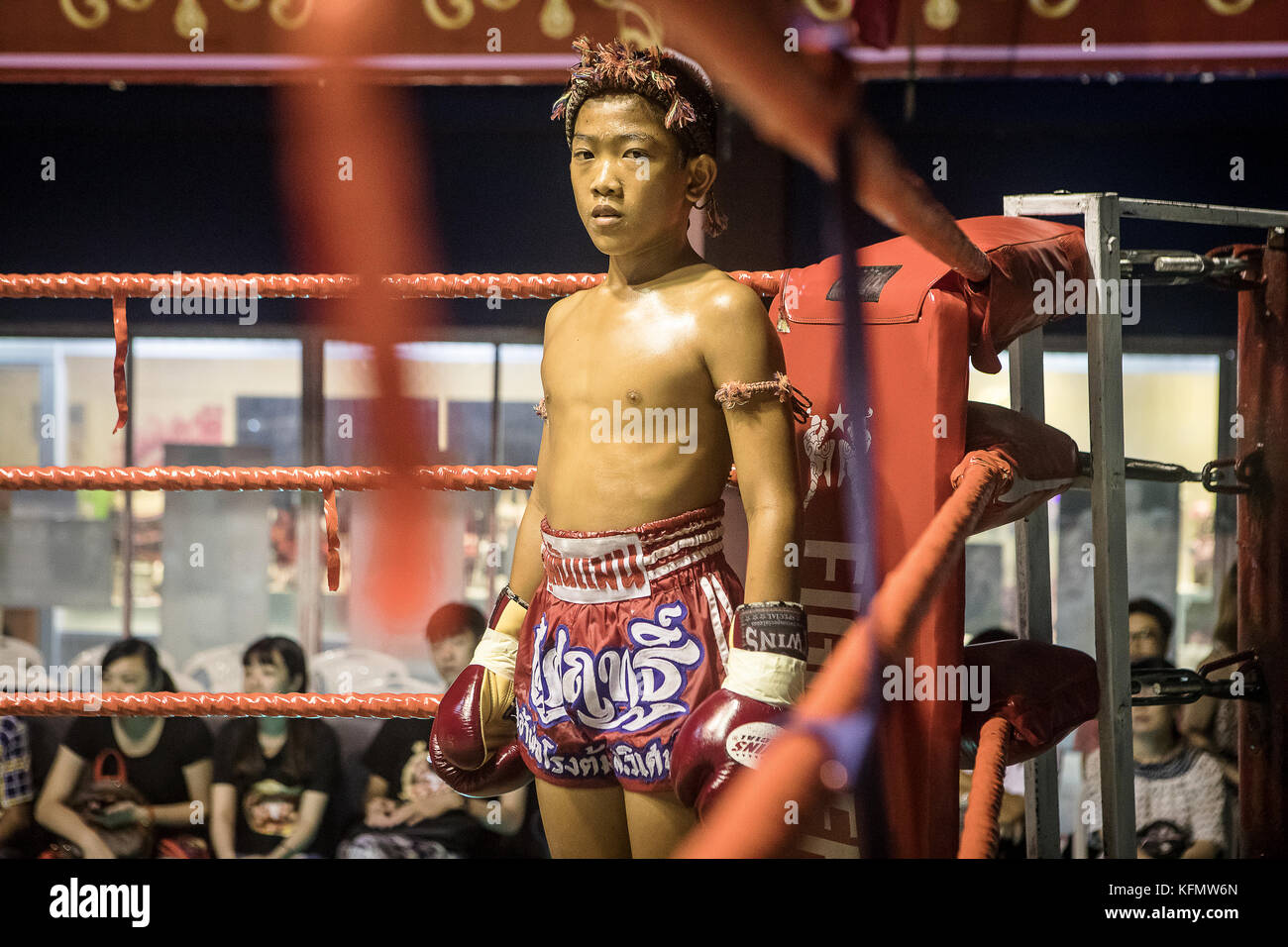 Portrait. Boy, Muay Thai boxer before the fight starts, Bangkok ...