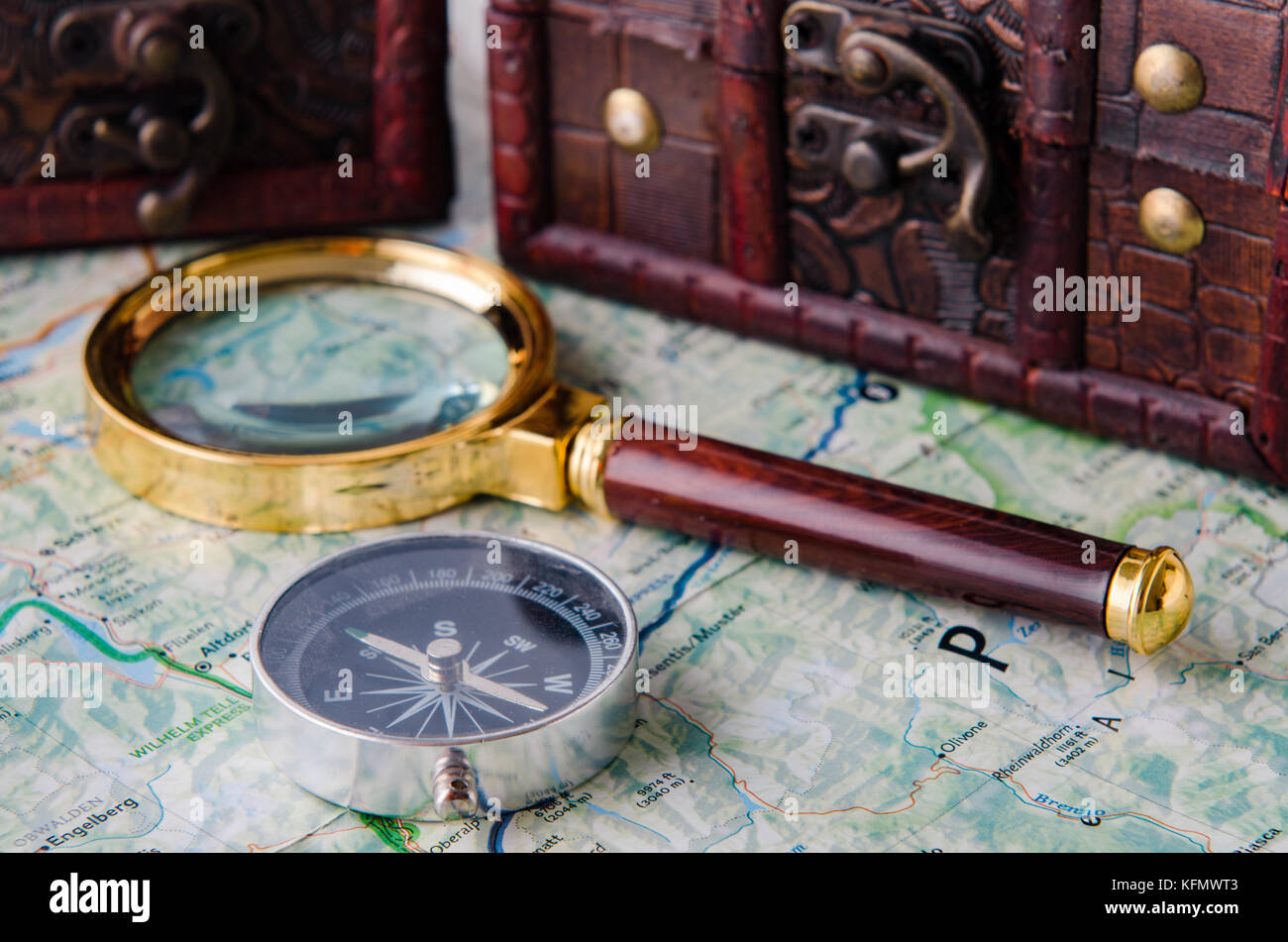 Travel concept with compass and map Stock Photo - Alamy