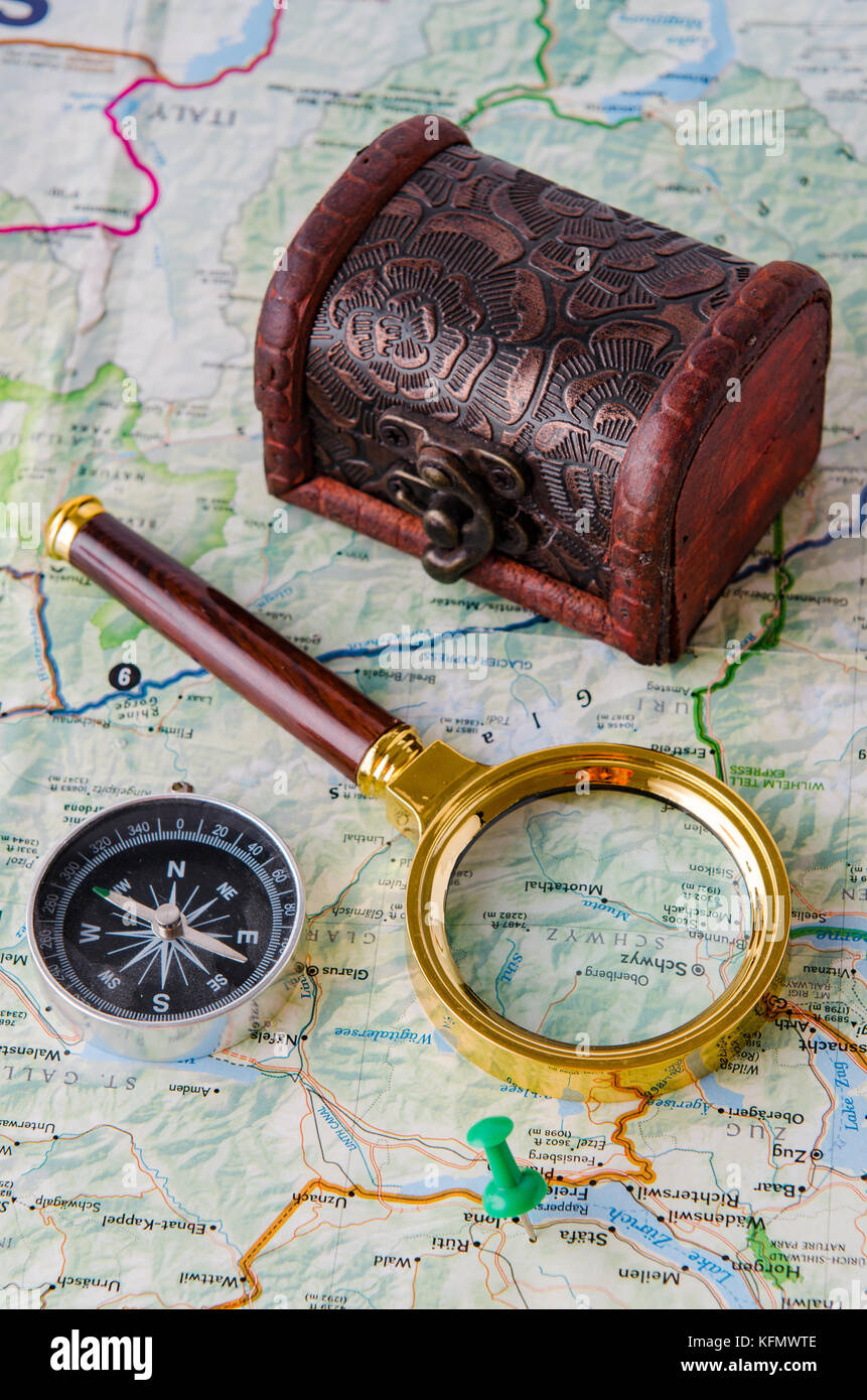 Travel concept with compass and map Stock Photo - Alamy