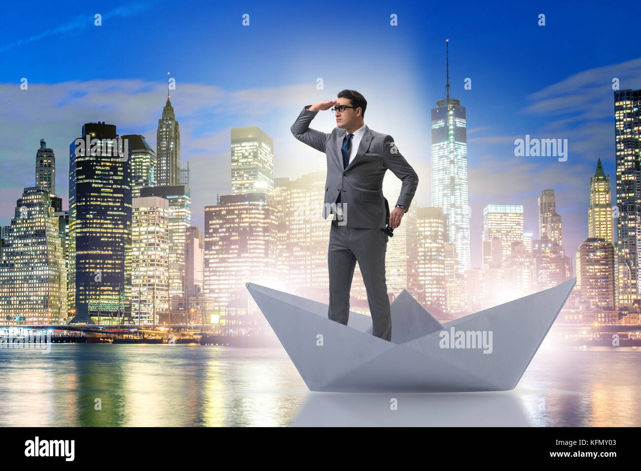 Businessman looking into future with binoculars in paper ship boat ...