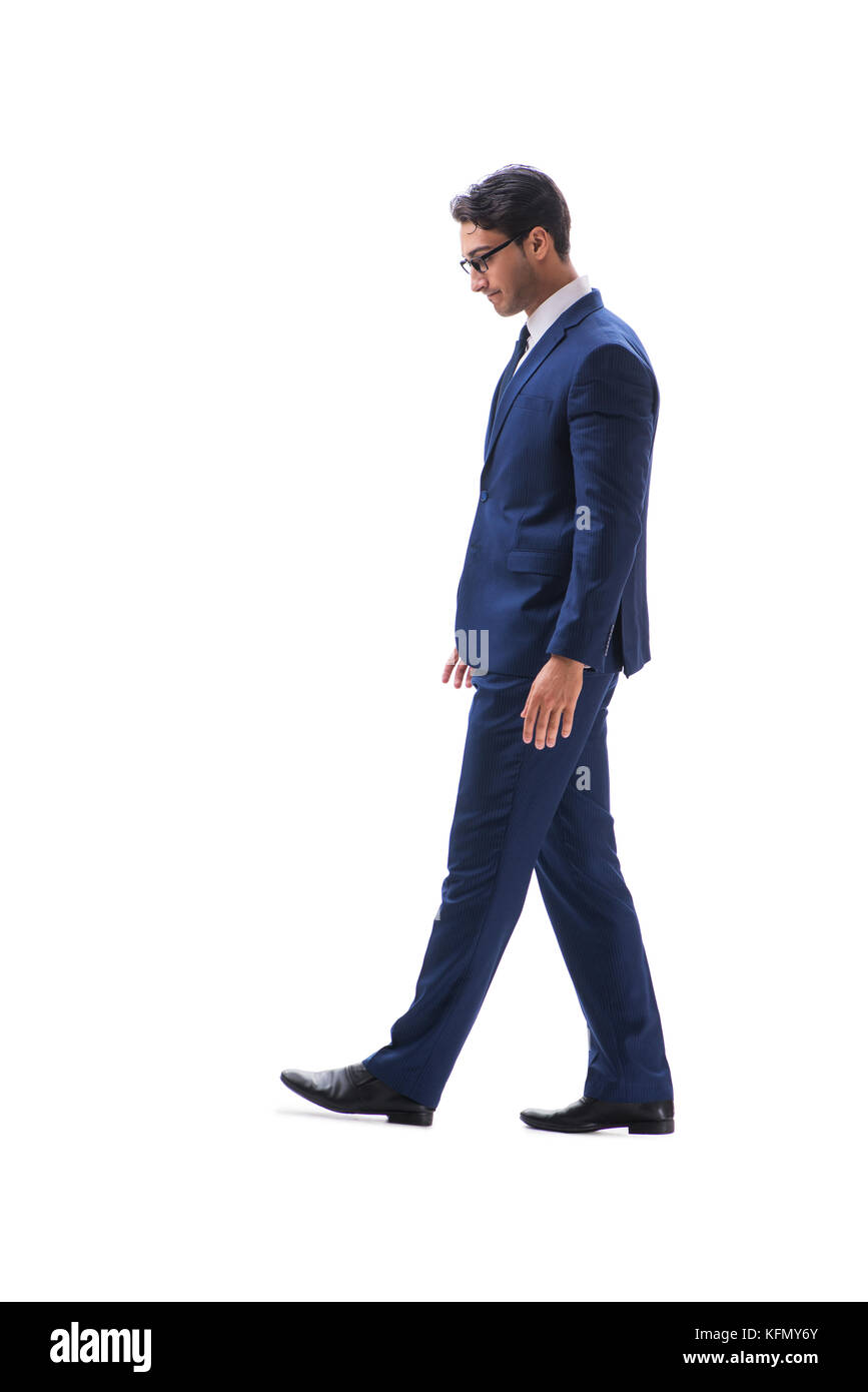 Businessman walking standing side view isolated on white background ...