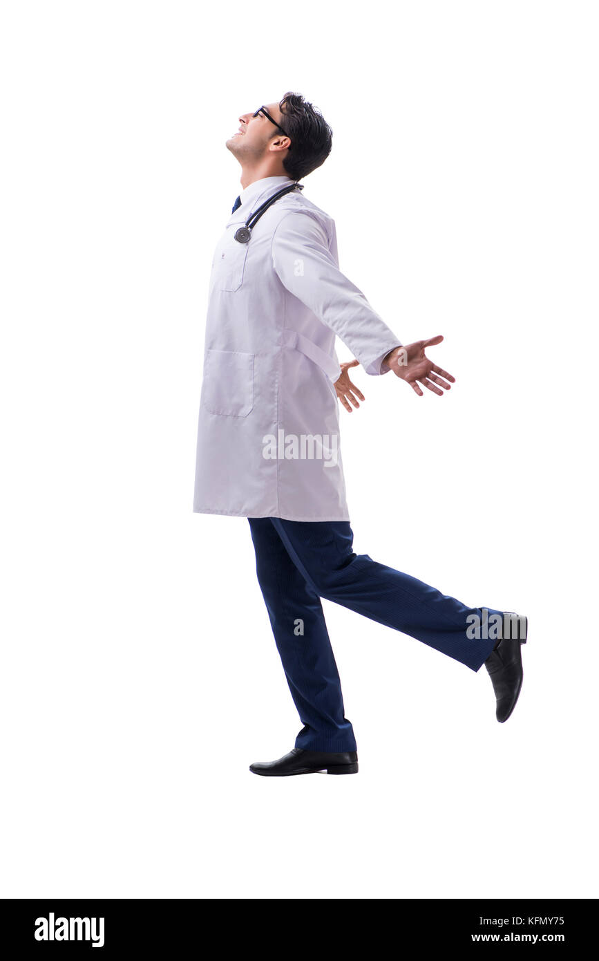 Young doctor physician standing walking isolated on white background ...