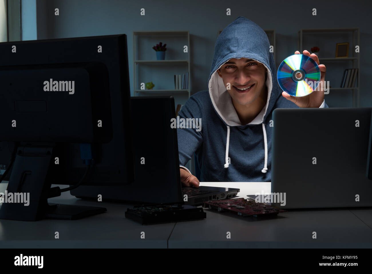 Hacker hacking computer at night Stock Photo - Alamy