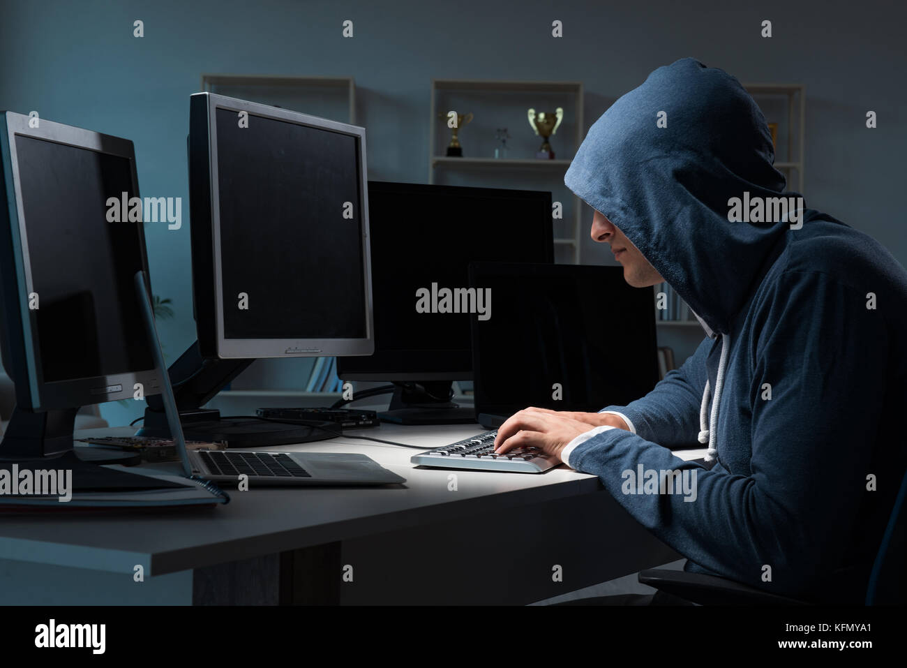 Hacker hacking computer at night Stock Photo - Alamy