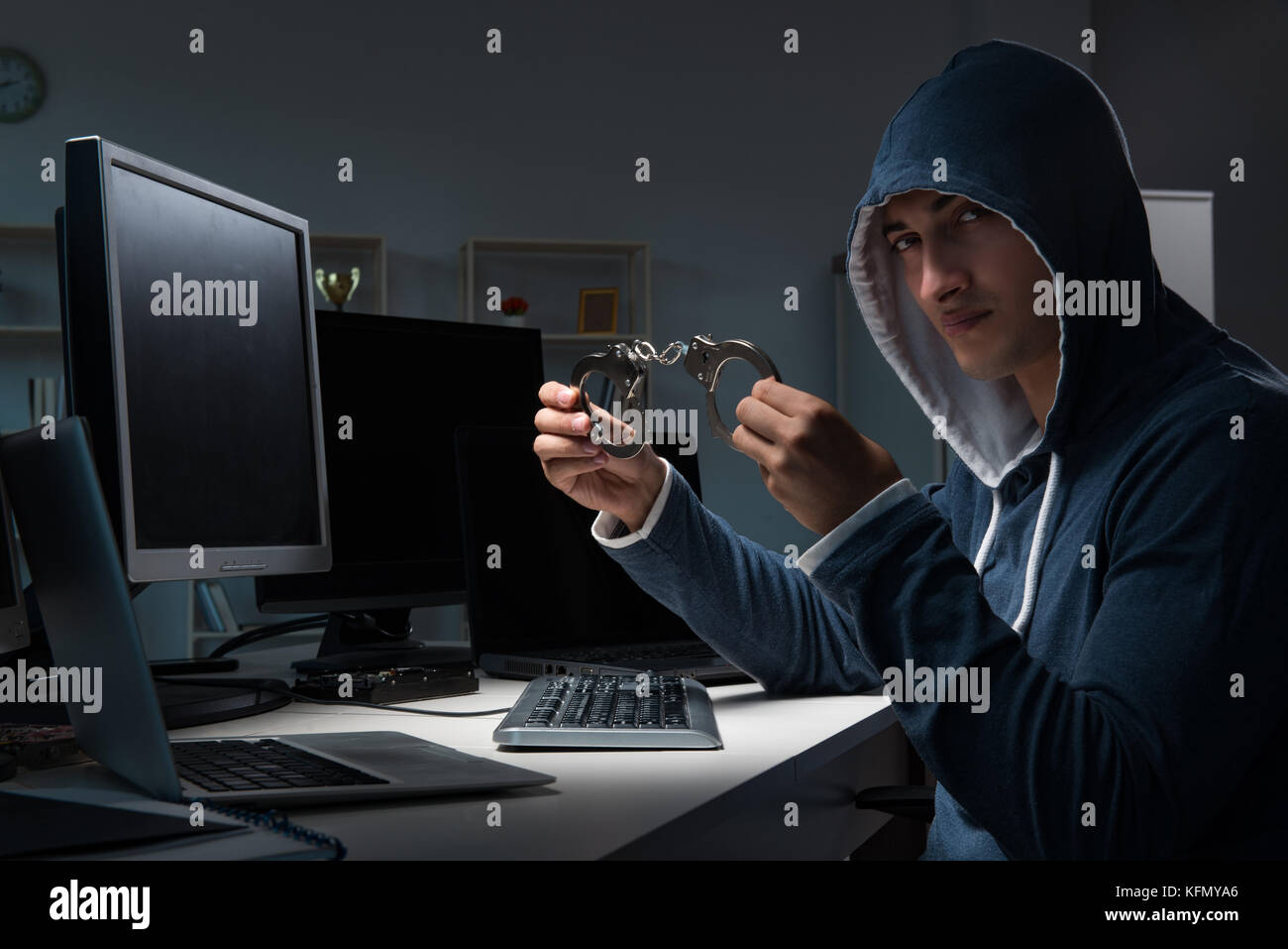 Hacker hacking computer at night Stock Photo - Alamy