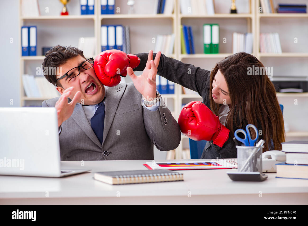 Office conflict between man and woman Stock Photo - Alamy