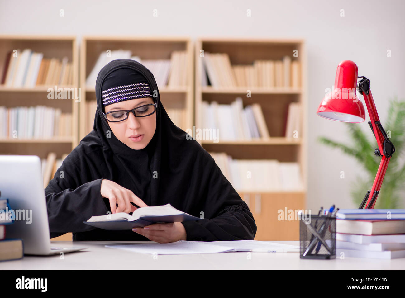 Muslim girl in hijab studying preparing for exams Stock Photo - Alamy