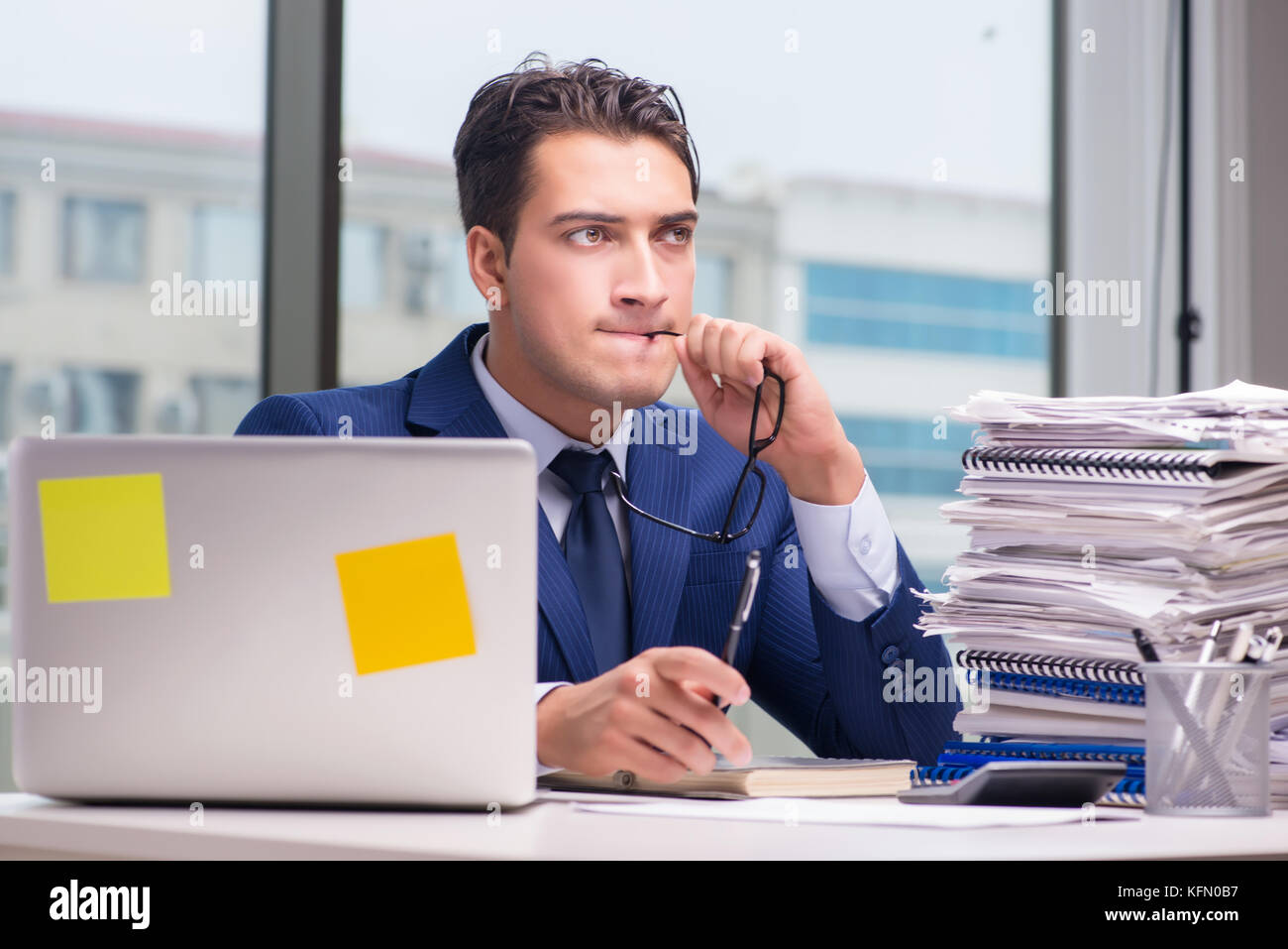 Workaholic businessman overworked with too much work in office Stock ...