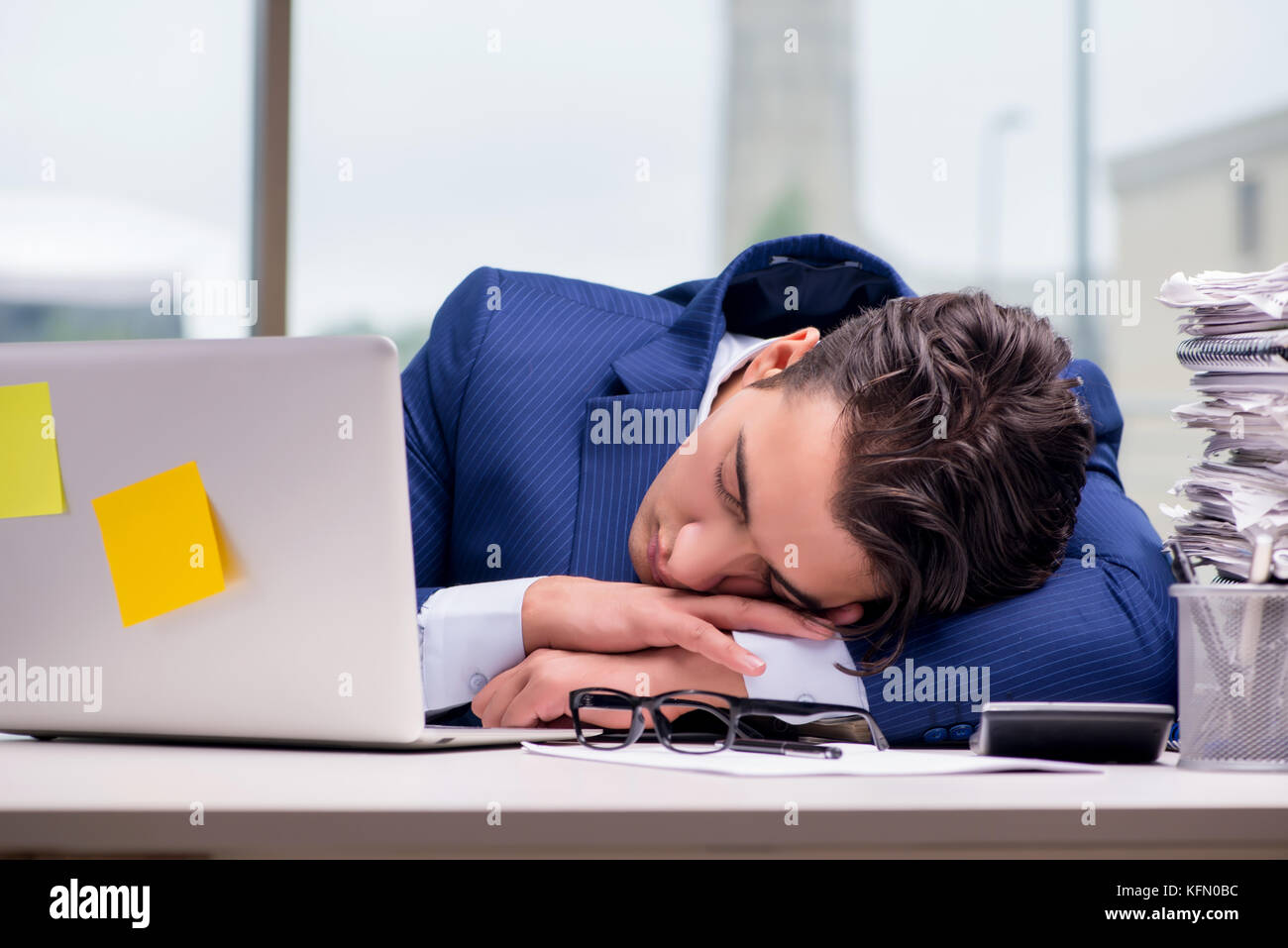 Workaholic businessman overworked with too much work in office Stock ...