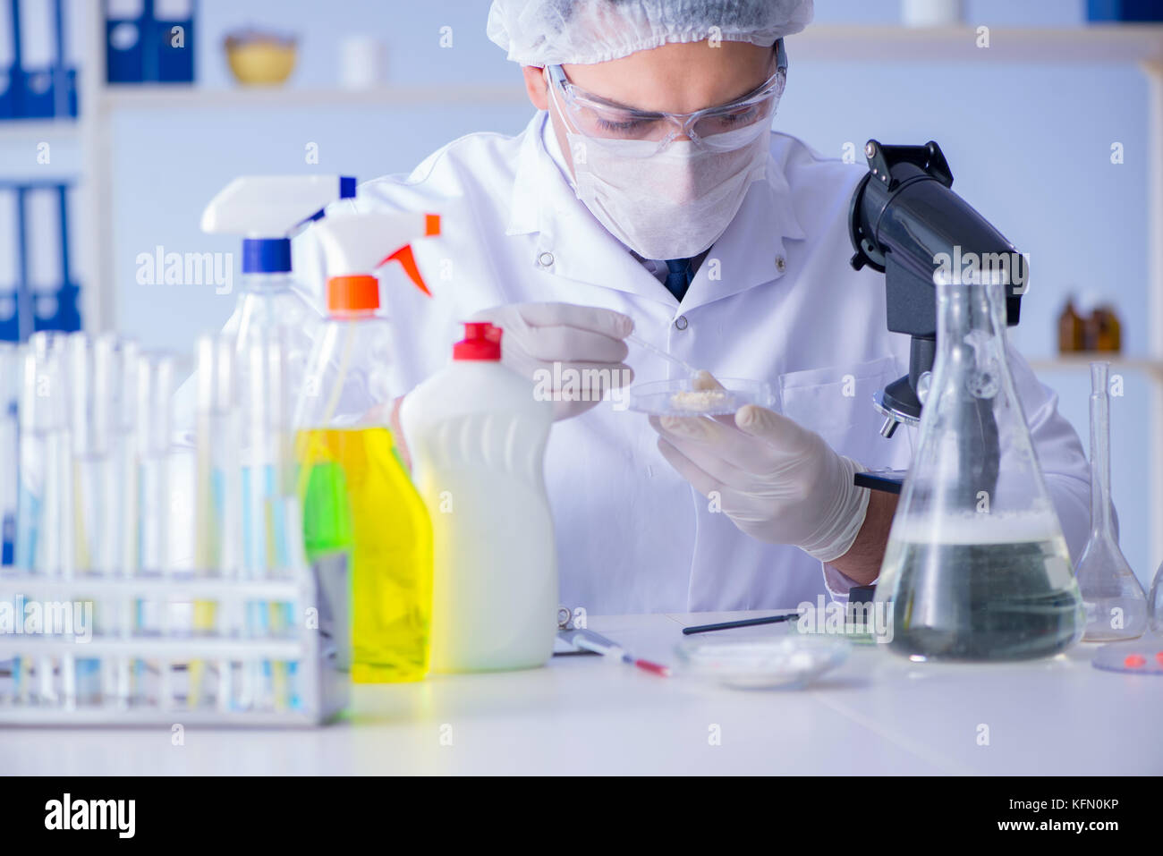 Man in the lab testing new cleaning solution detergent Stock Photo - Alamy