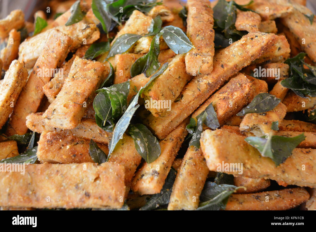Indian fired snacks made from fenugreek and refined flour Stock Photo ...