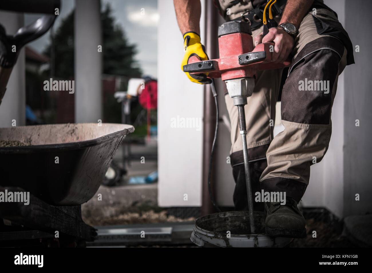 Contractor with Fusion Mixer. Preparing Concrete Material. House ...