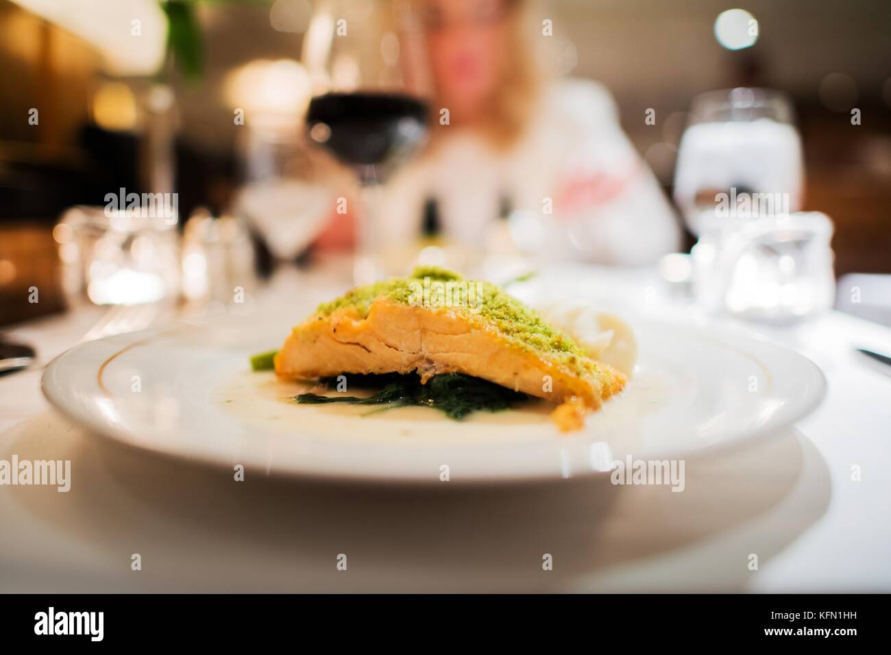 Grilled Salmon Dinner in the Elegant Restaurant Stock Photo - Alamy