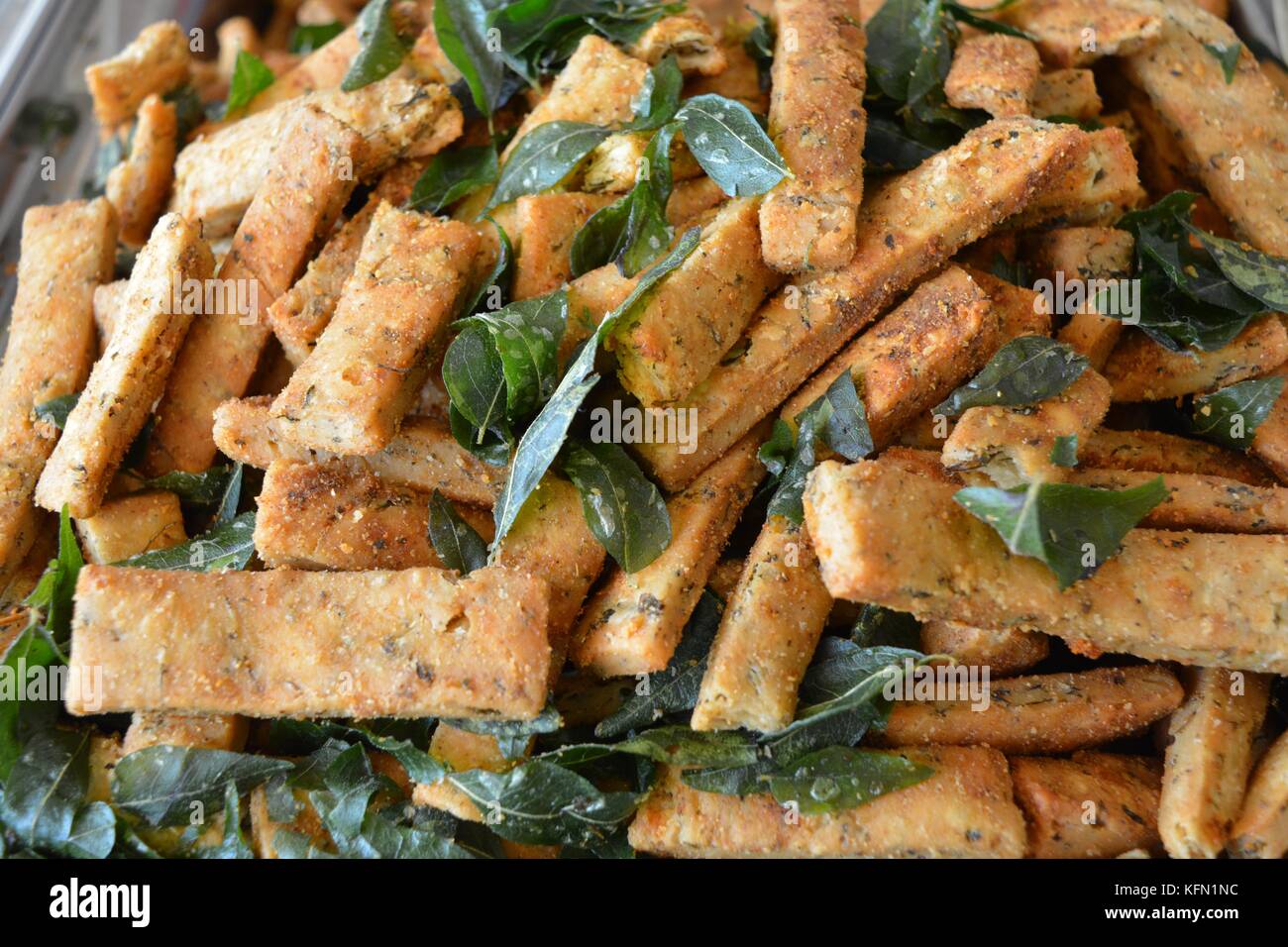 Indian fired snacks made from fenugreek and refined flour Stock Photo ...