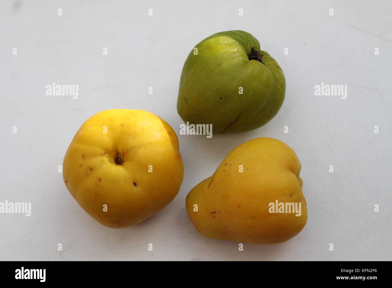 appetizing colorful quince fruits with seeds inside for cake of herbal ...