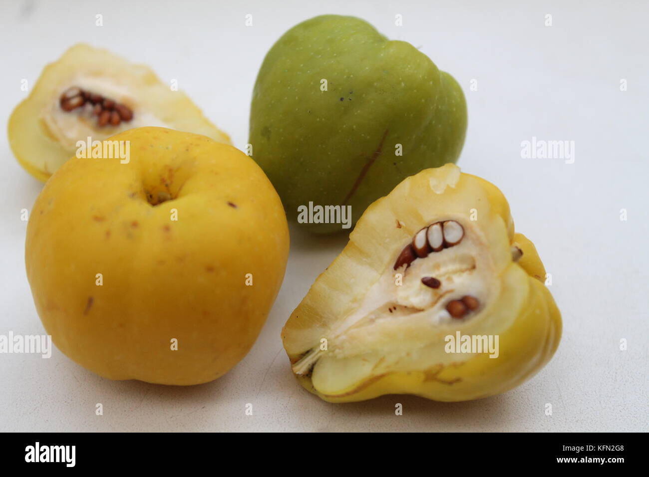 appetizing colorful quince fruits with seeds inside for cake of herbal ...