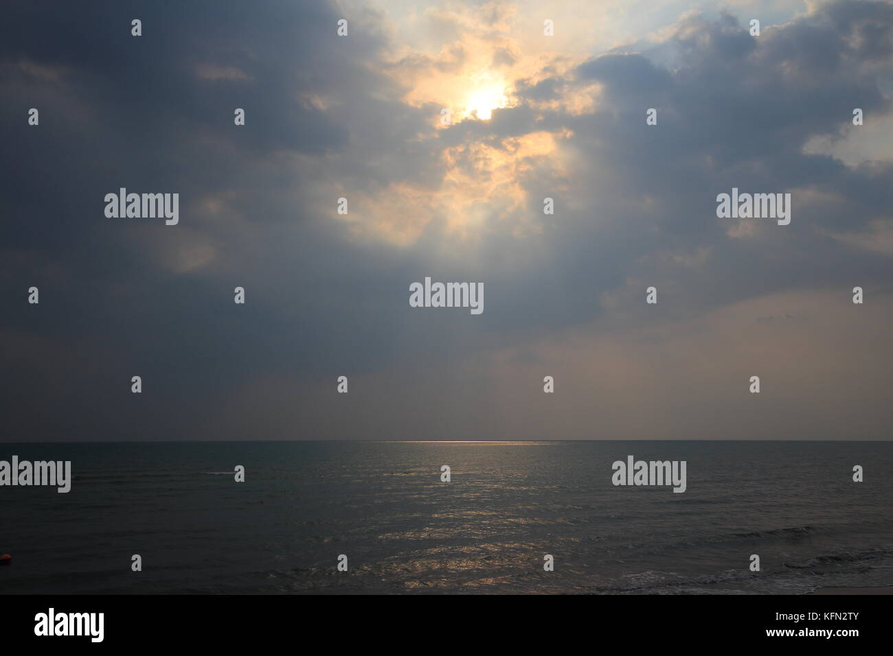 Cloud above the sea and dramatic sun ray Stock Photo - Alamy