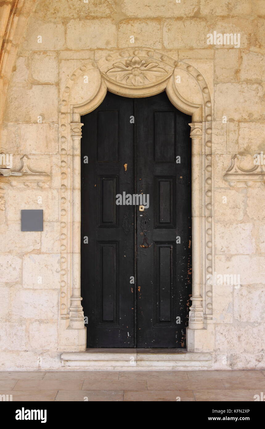 Wooden medieval squared style front door Stock Photo - Alamy