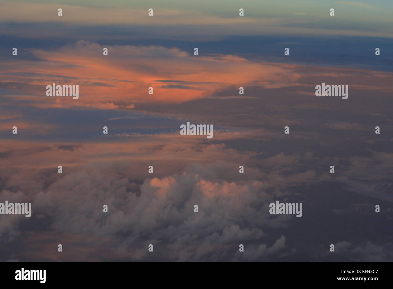 aerial view of pink cloud. Morning sky. twilight hour soft sun light ...