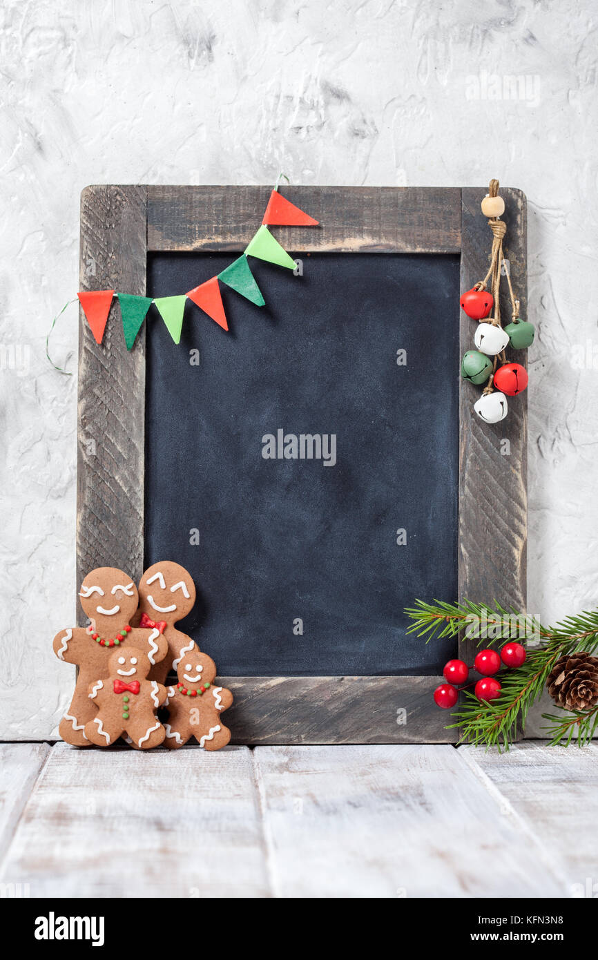Gingerbread man family and chalkboard Stock Photo - Alamy