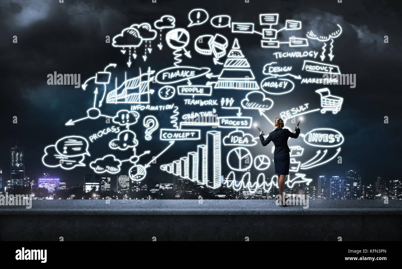 Woman throwing light on her ideas Stock Photo - Alamy