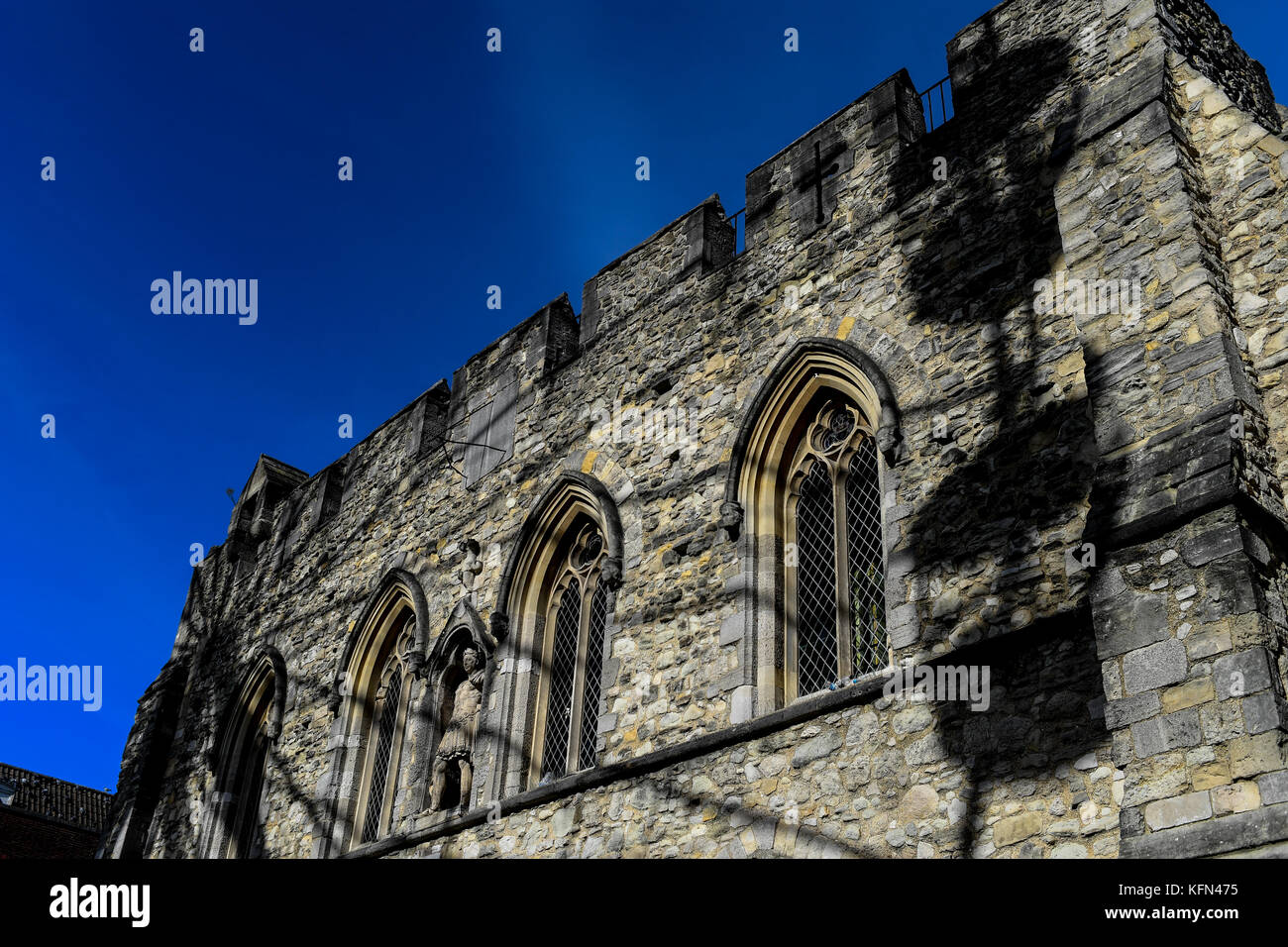 The Bargate in Southampton with the shadows of a near by ferris wheel ...