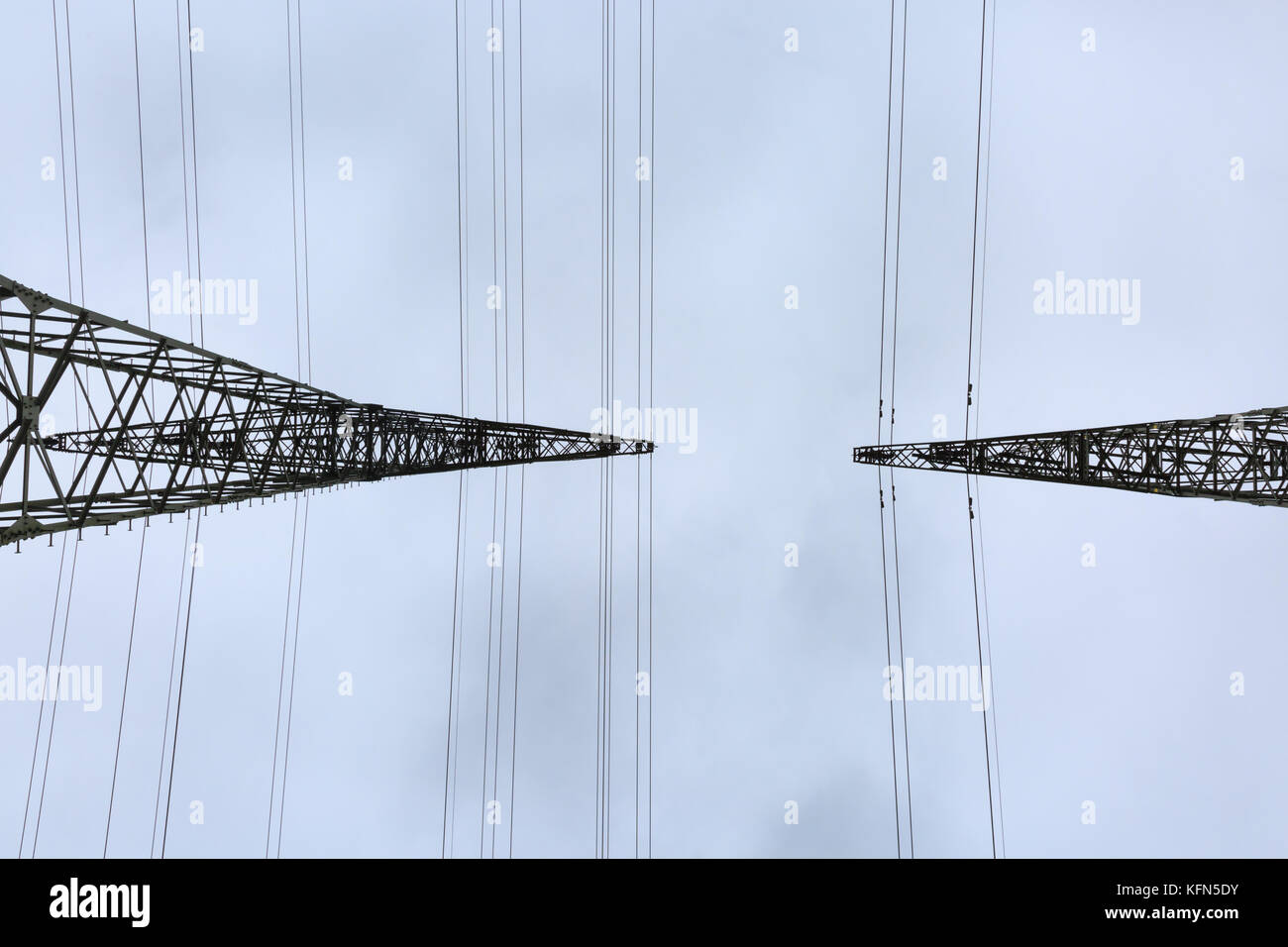 Overhead power line masts, detail shot, low angle view up, Germany ...