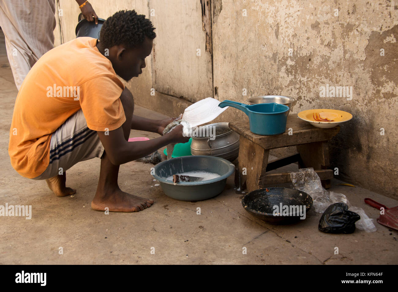 Poor man washing hi-res stock photography and images - Alamy