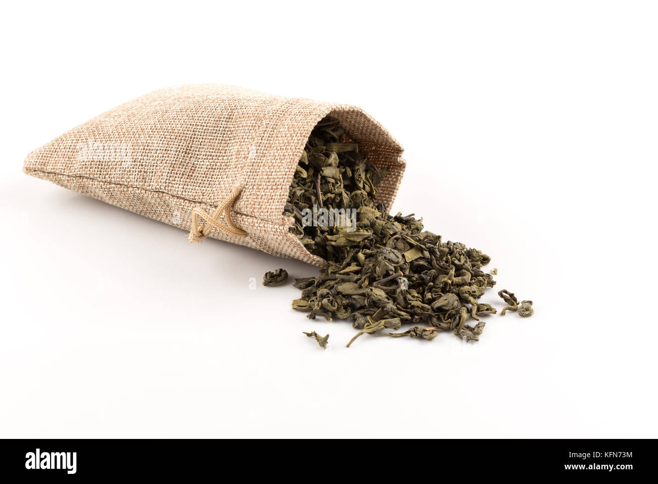 Gunpowder green tea in hessian sack closeup photo for background Stock ...