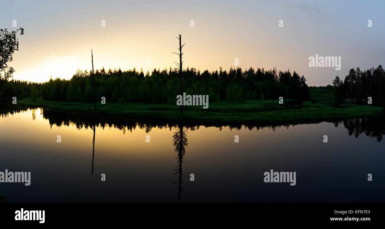 Beautiful sunset at the forest river Stock Photo - Alamy