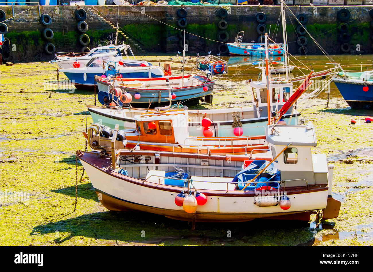 Fishing Boats at tides out Stock Photo - Alamy